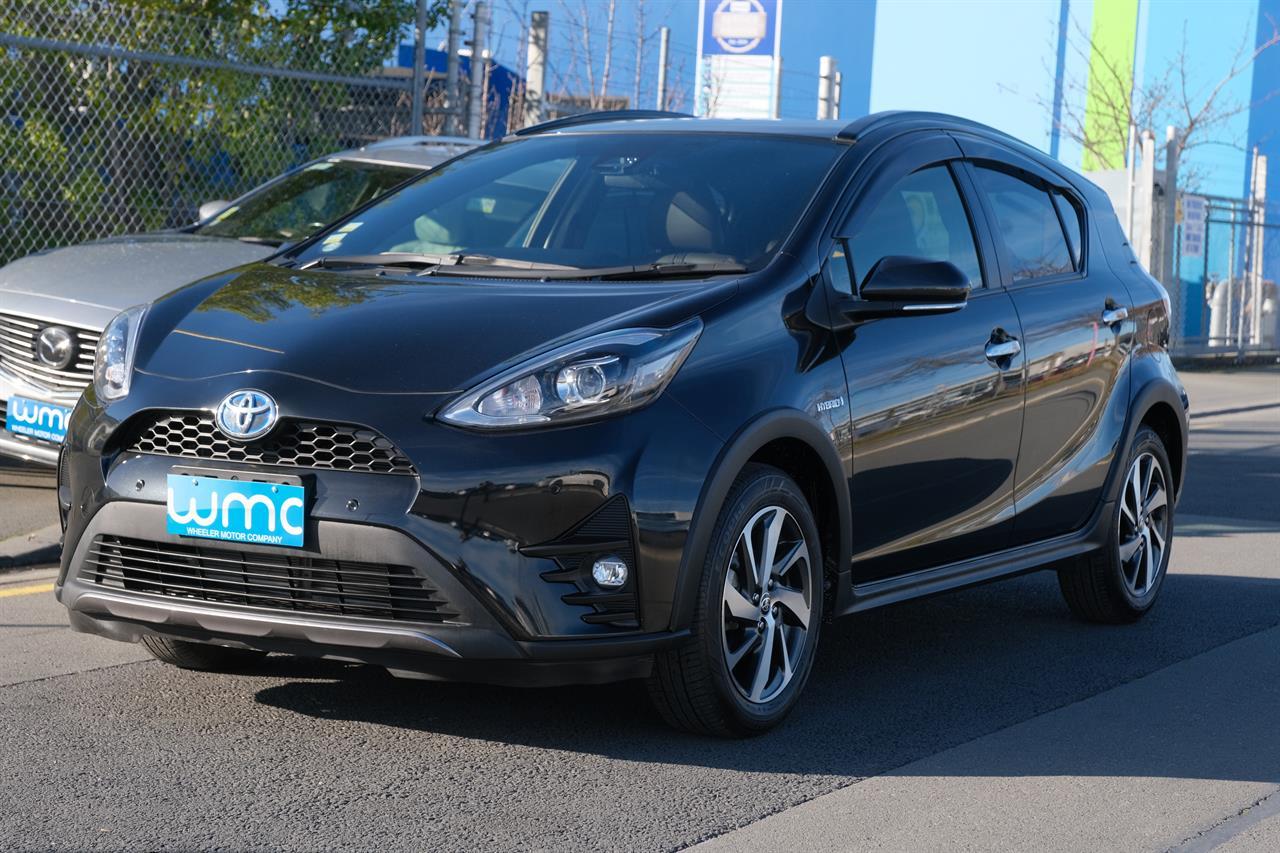 2020 Toyota Aqua 1.5lt Hybrid Crossover with TSS on handshake